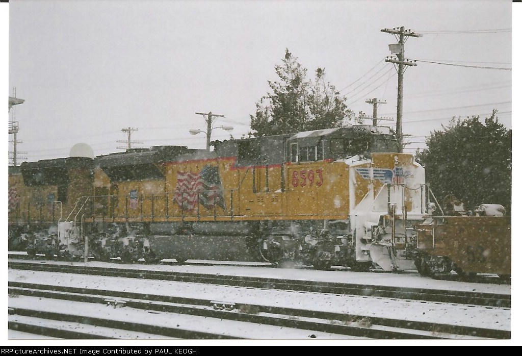 UP 8593 at the UP Depot waiting for a crew to go west as the snow still falls.